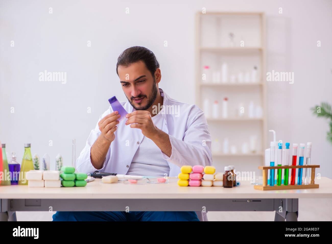 Young chemist testing soap in the lab Stock Photo - Alamy