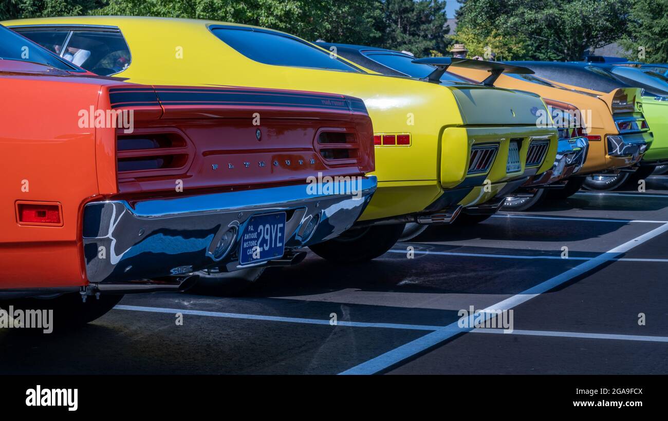 PLYMOUTH, MI/USA - JULY 26, 2021: Four vintage Detroit muscle cars ...