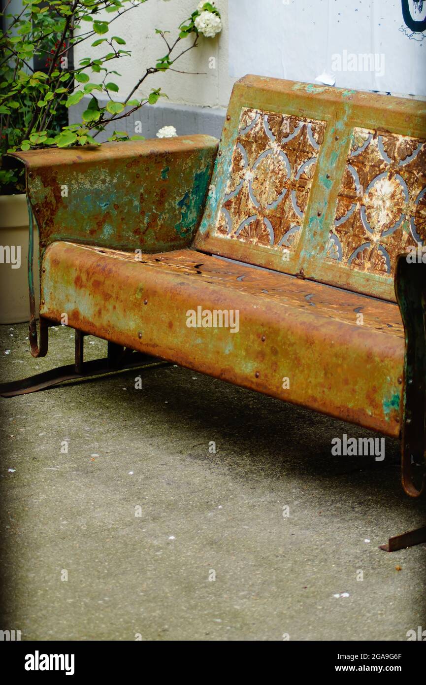 Weathered bench in a courtyard Stock Photo - Alamy