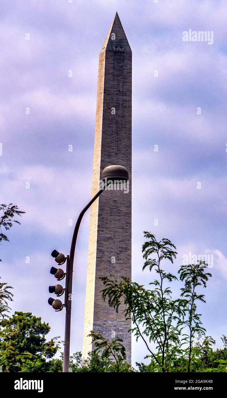 Traffic signals curve into the shape of the Washington Monument, in ...
