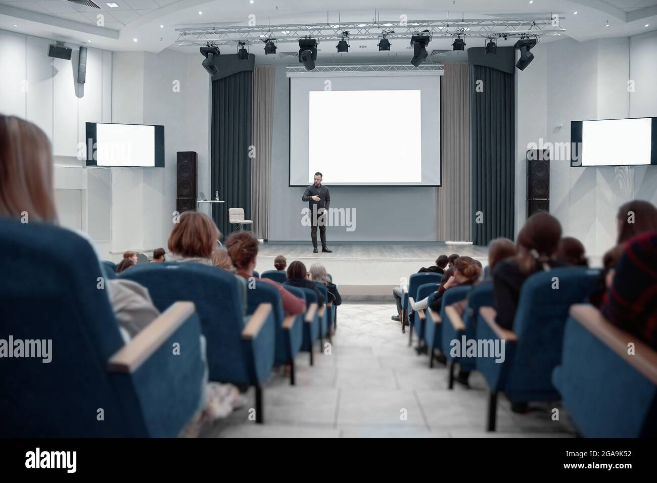 speaker standing near the big screen during a business seminar Stock ...