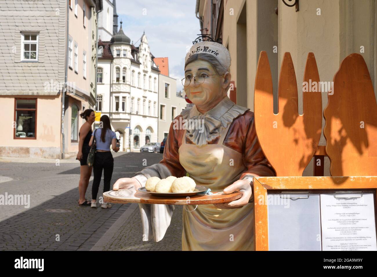 Weimar, Germany, old town, figure with Thuringian Dimplings in front of ...