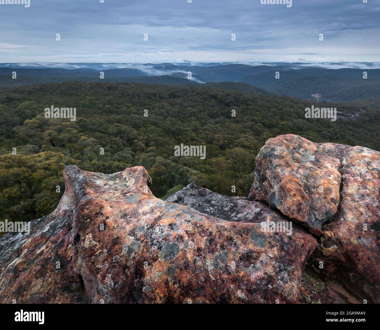 view from a mountain into the valley Stock Photo - Alamy