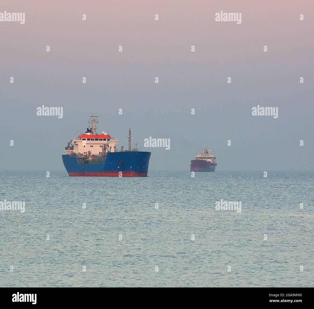Two industrial ships vessels on the sea Stock Photo - Alamy