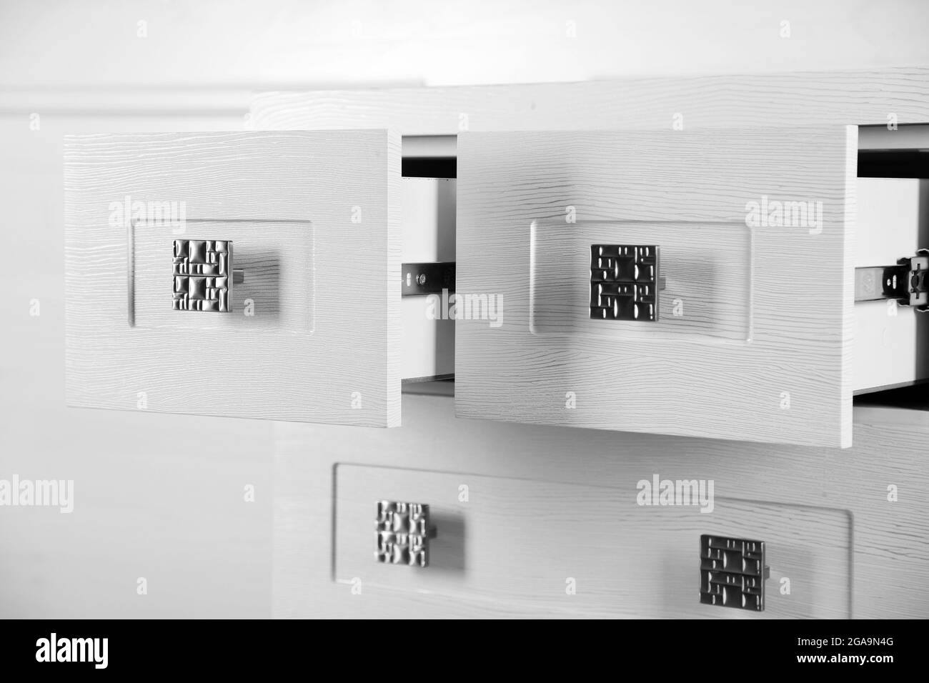 White wooden chest of drawer, close up. Open drawer Stock Photo - Alamy