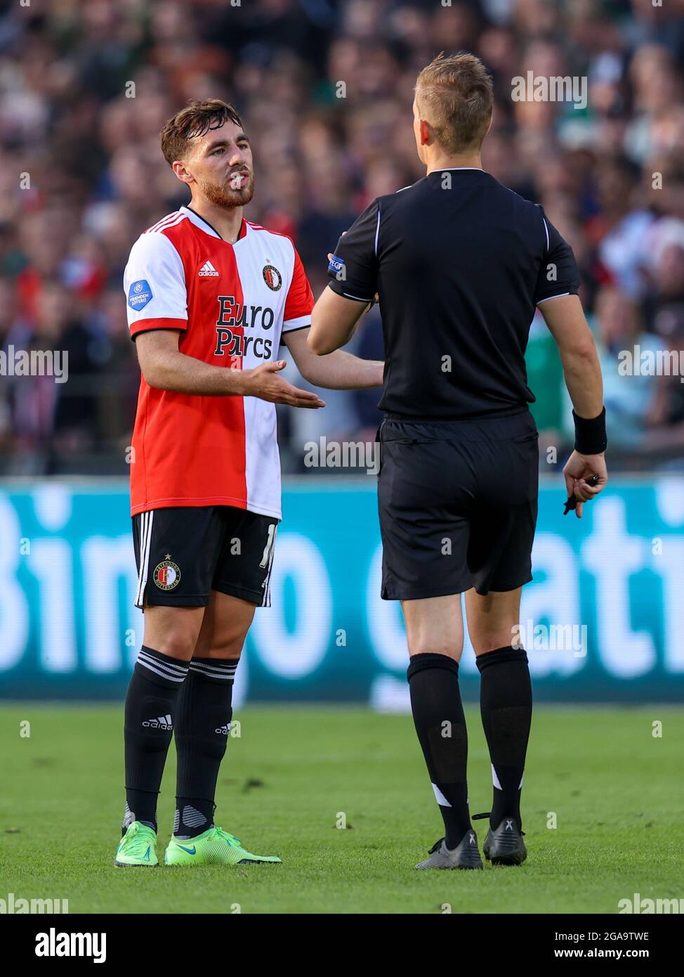 ROTTERDAM, NETHERLANDS - JULY 29: Orkun Kokcu of Feyenoord, referee Espen Eskas during the UEFA ...