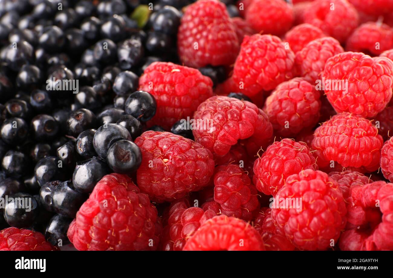 Mix of different berries as background Stock Photo - Alamy