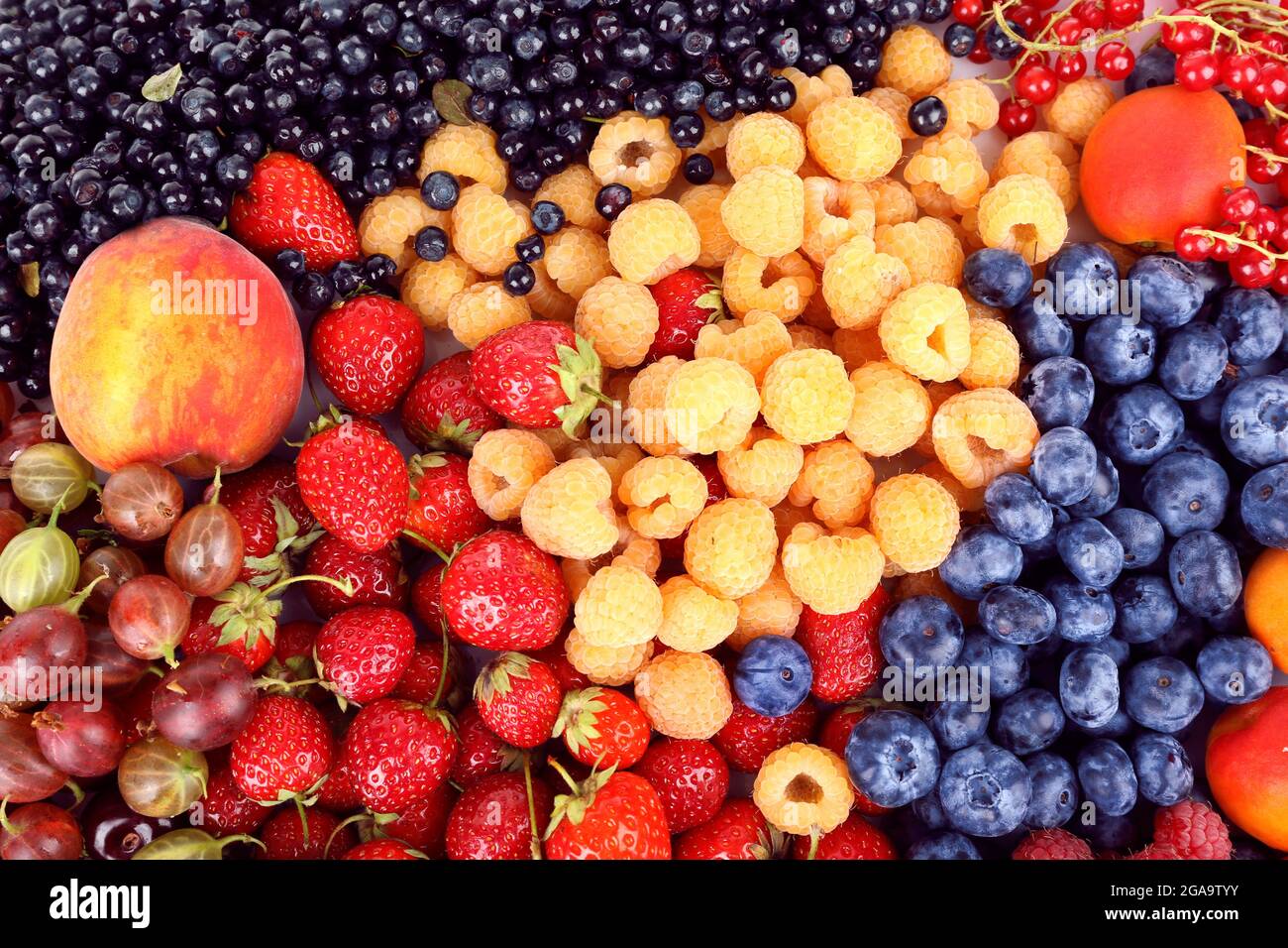 Mix of different berries as background Stock Photo - Alamy