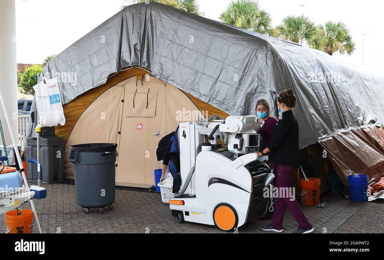 Melbourne, United States. 29th July, 2021. Nurses bring a portable x ...