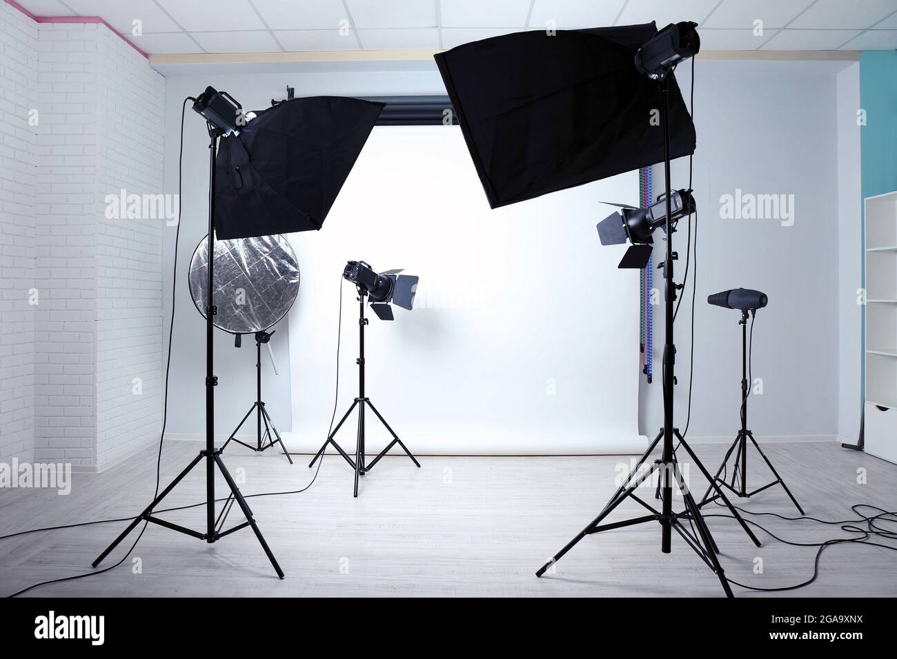 Empty photo studio with lighting equipment Stock Photo - Alamy