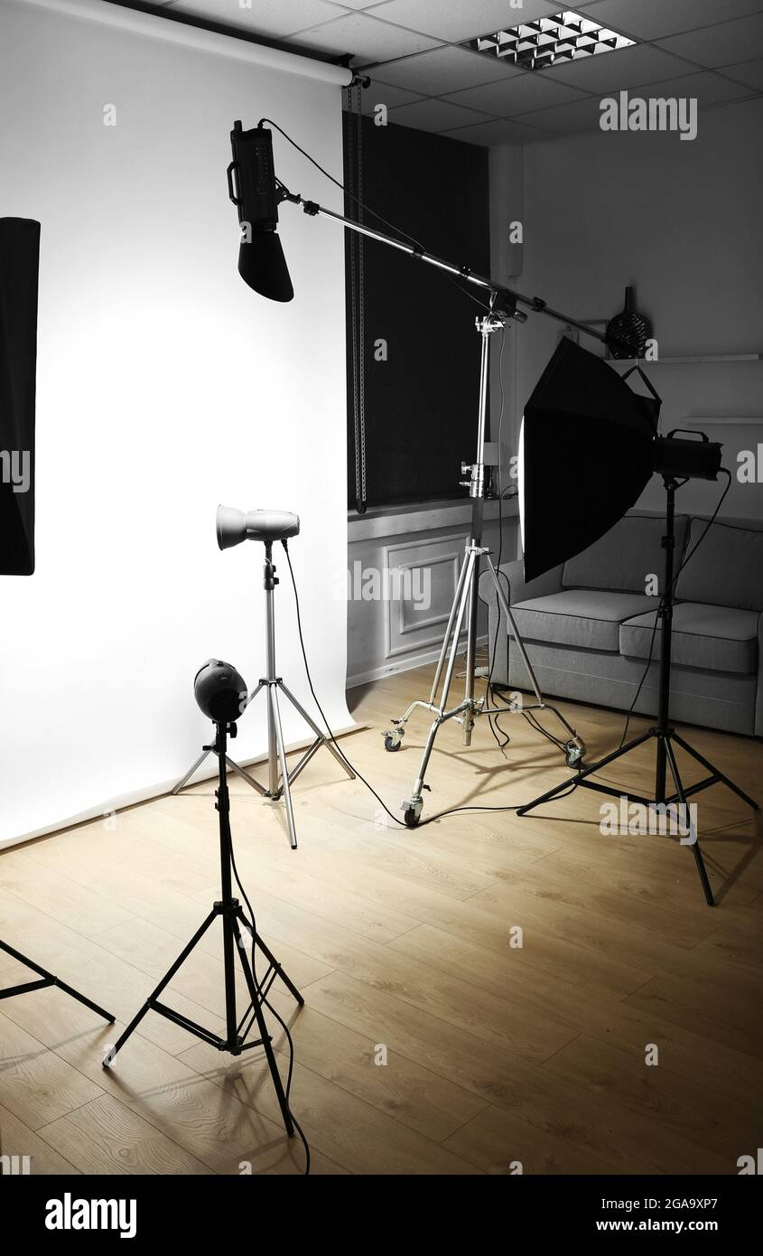 Empty photo studio with lighting equipment Stock Photo - Alamy
