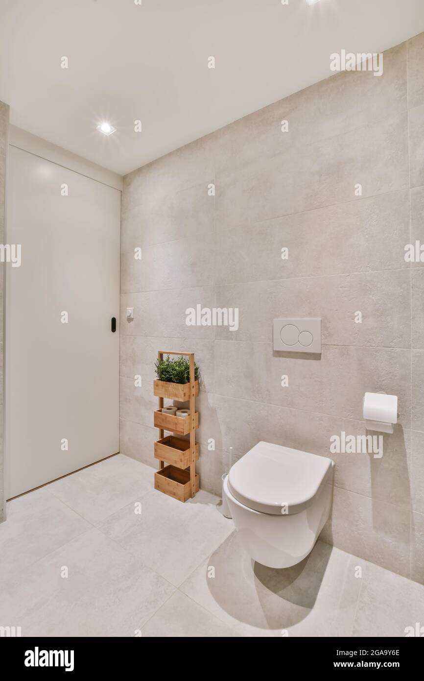 Interior of small clean washroom in miniature style Stock Photo - Alamy