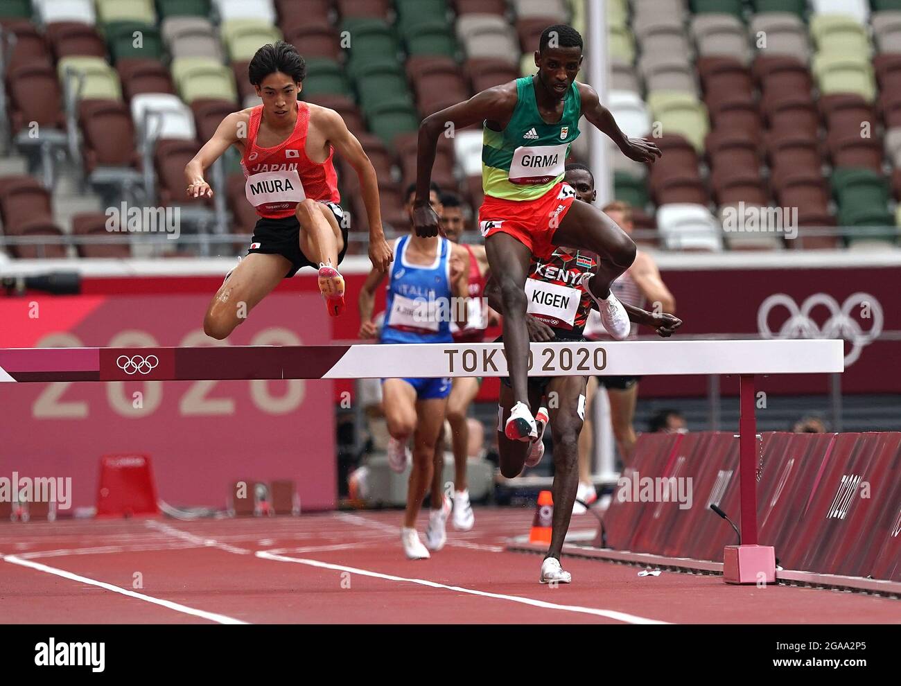 Tokyo, Japan. 30th July, 2021. Lamecha Girma of Ethiopia (L) and Miura ...