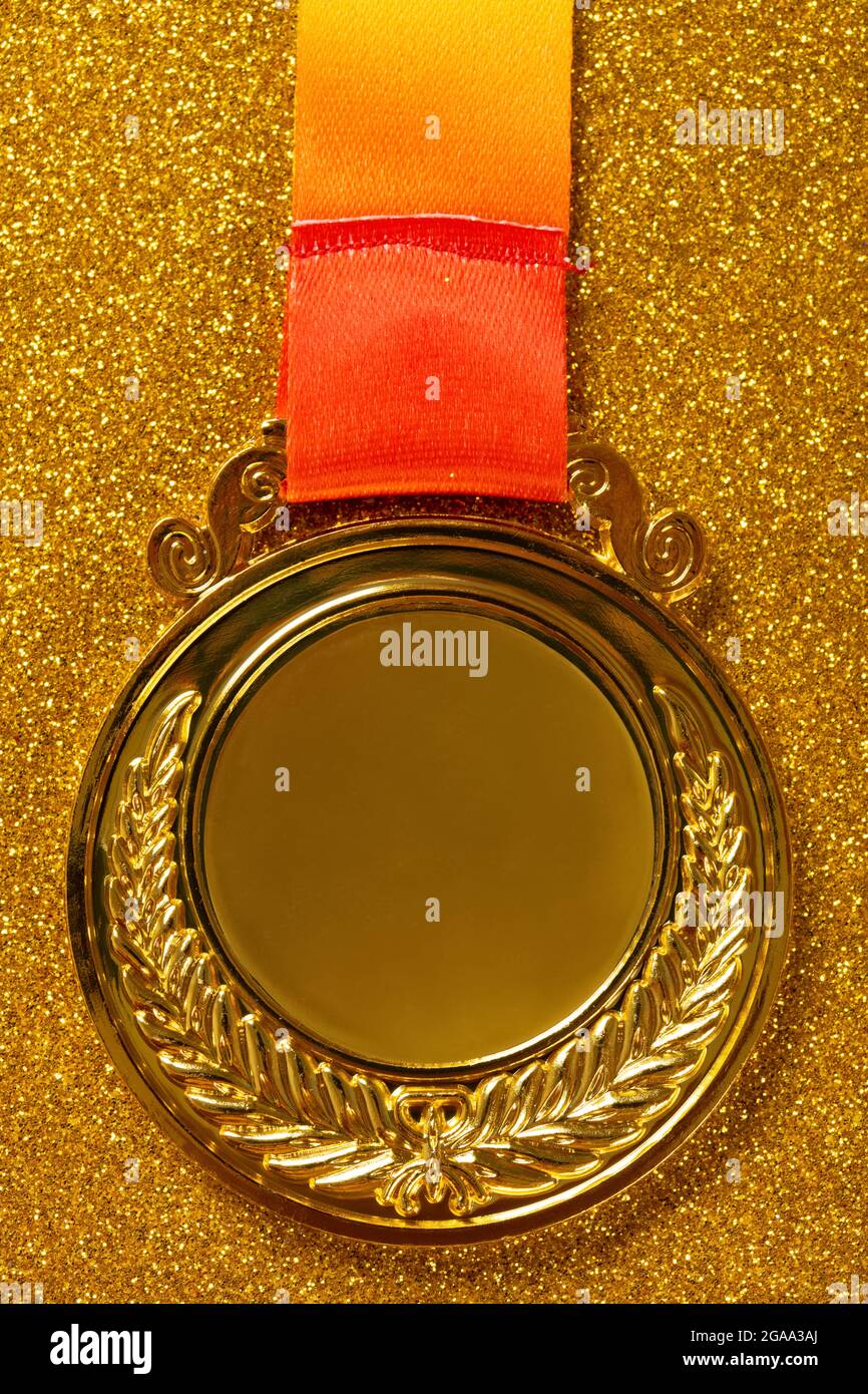 top view gold medal on a gold background vertical composition Stock ...