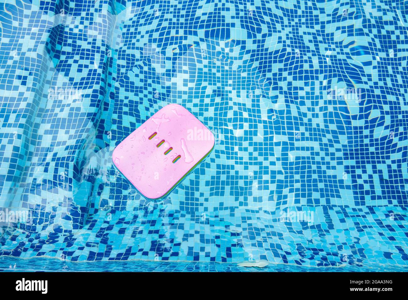 floating pad on the water of a swimming pool Stock Photo - Alamy