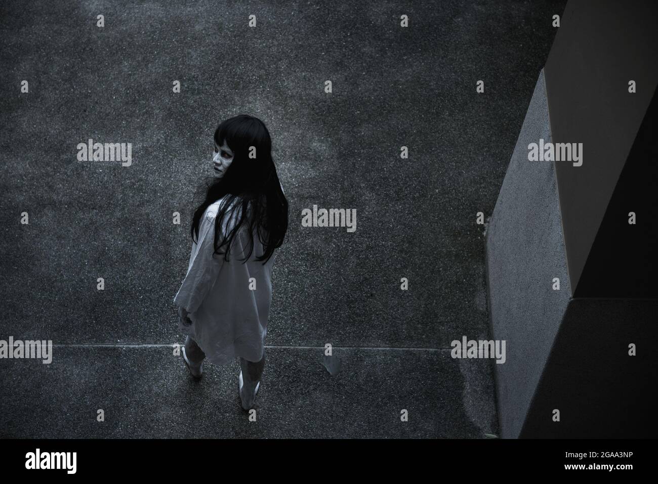 Back woman ghost horror under building house, halloween concept Stock ...