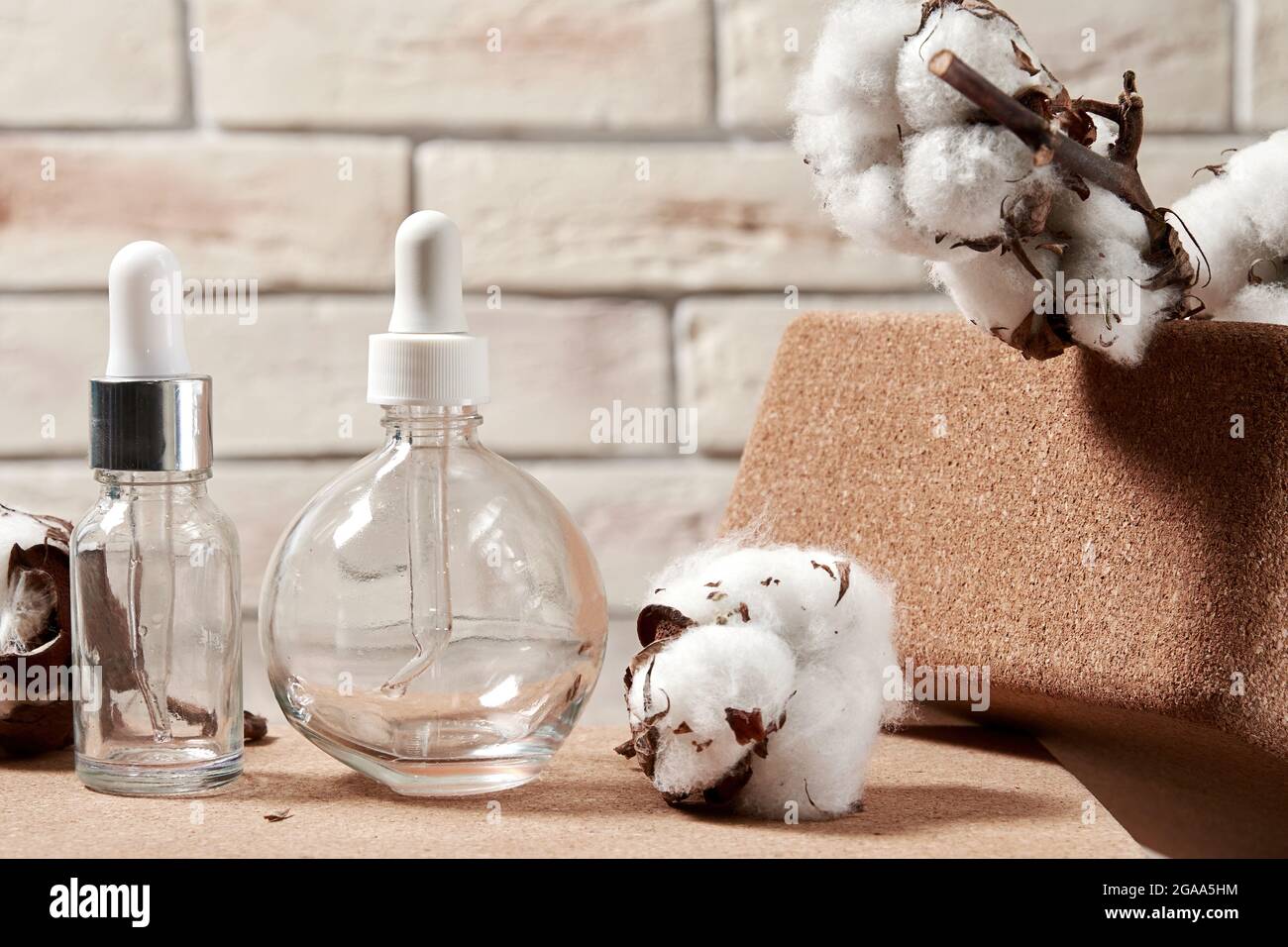 Empty flasks for cosmetics liquids on the decorated makeup desk ...
