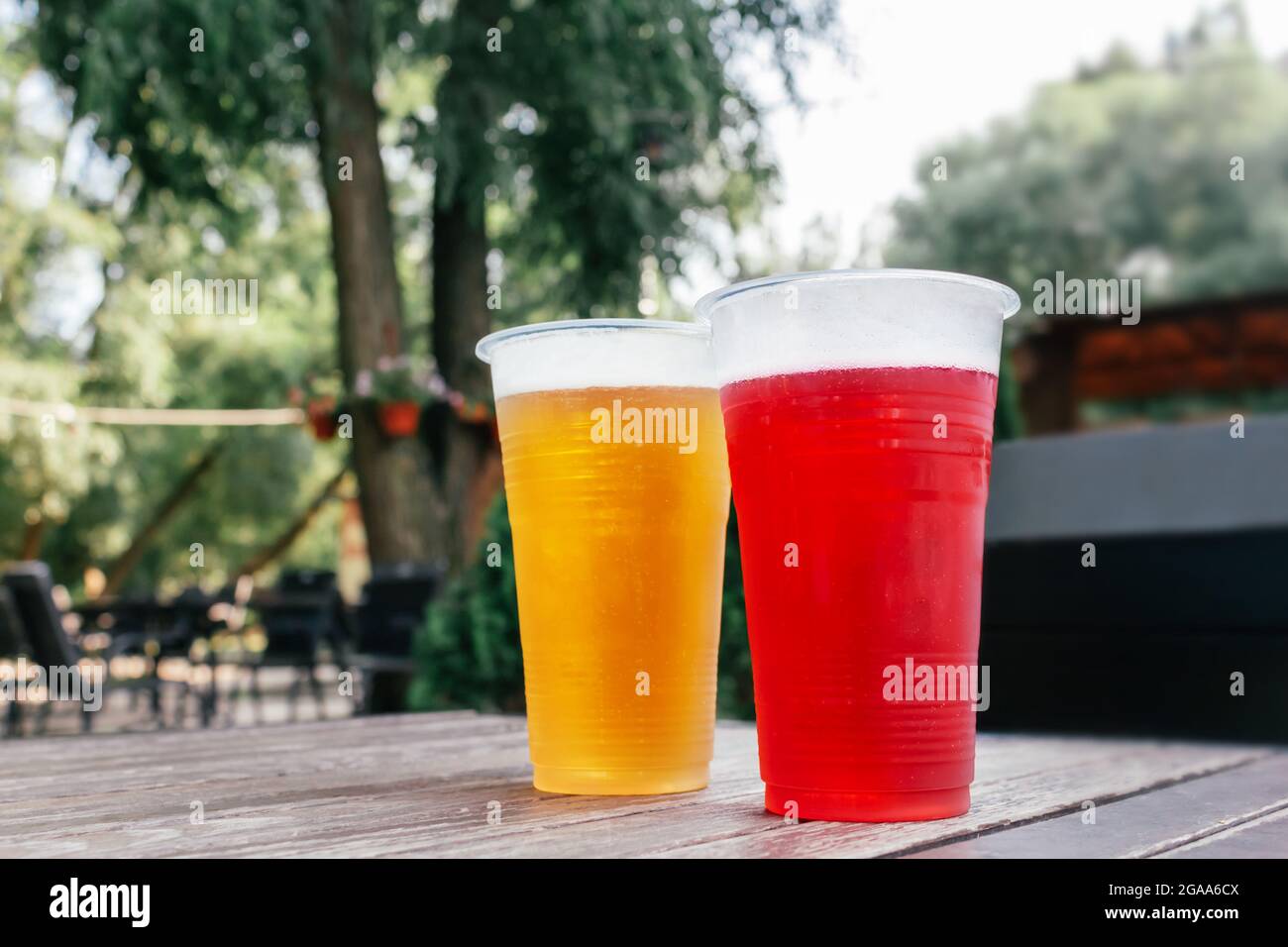 Light, cherry beer in glass on table Stock Photo - Alamy