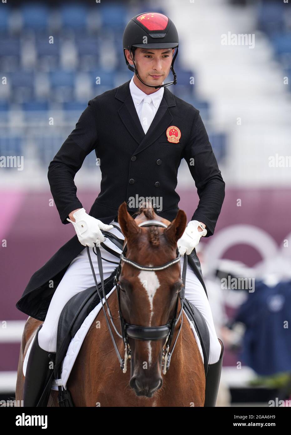 Tokyo, Japan. 30th July, 2021. Alex Hua Tian of China and his horse ...