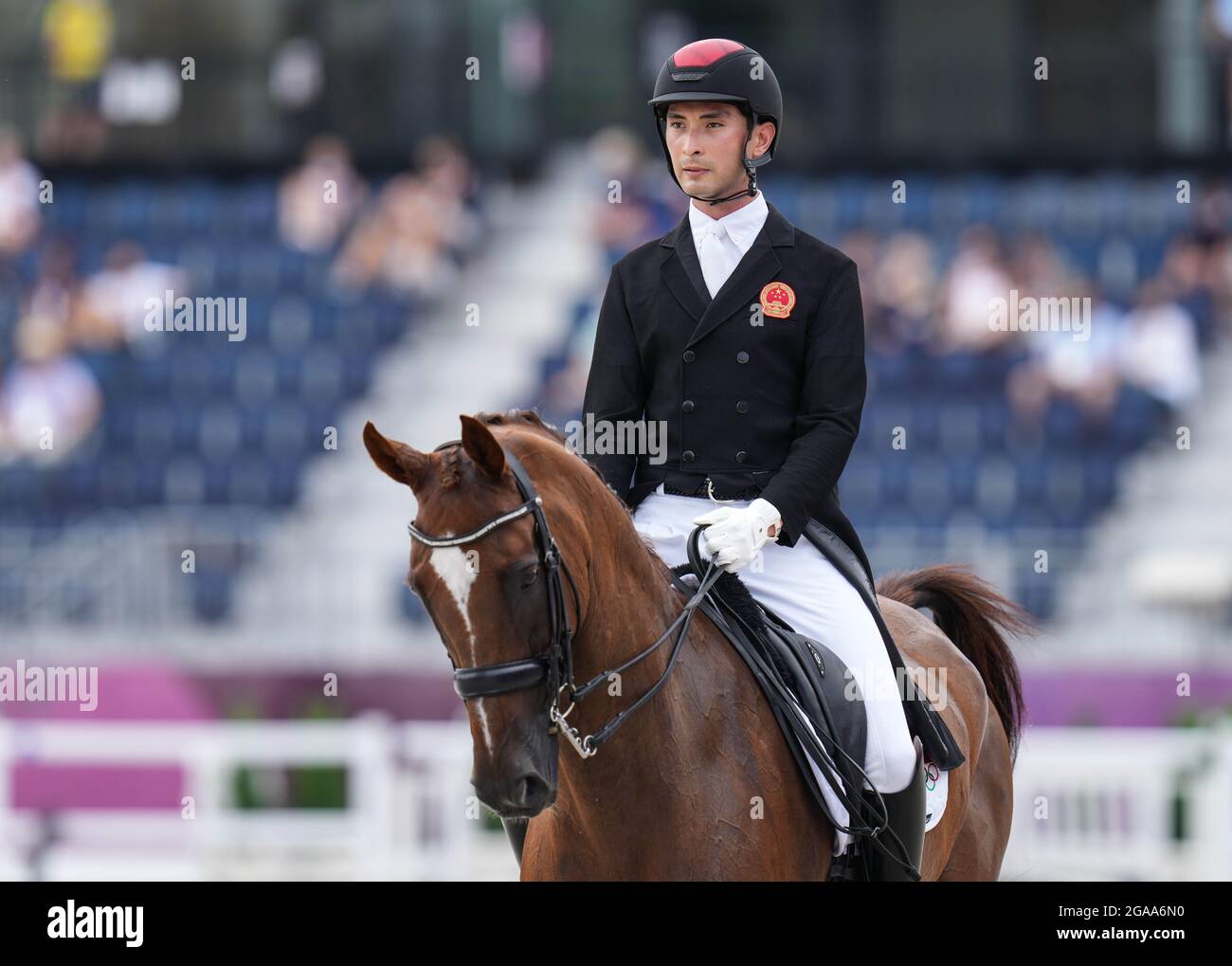 Tokyo, Japan. 30th July, 2021. Alex Hua Tian of China and his horse ...