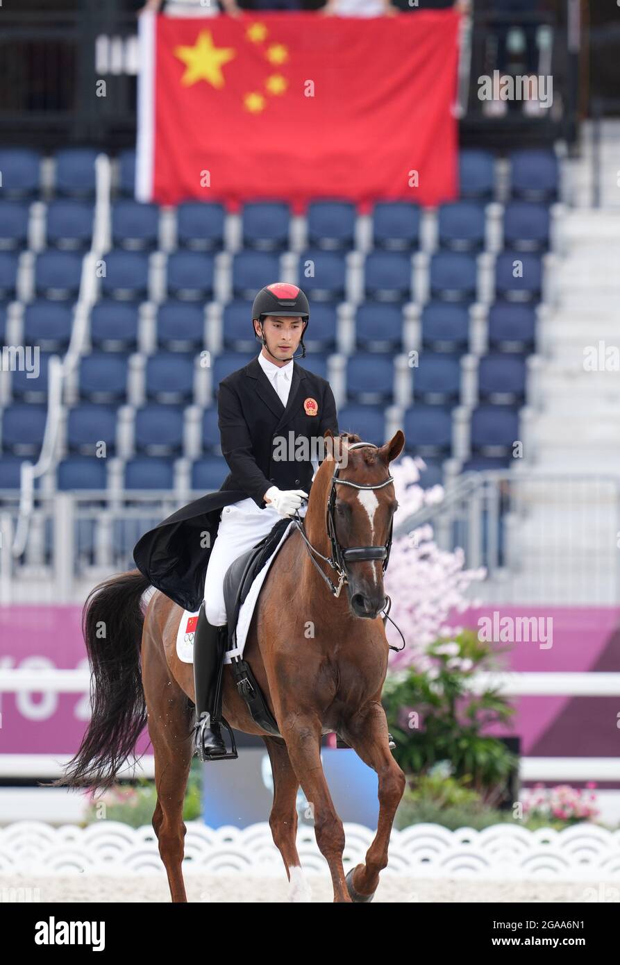 Tokyo, Japan. 30th July, 2021. Alex Hua Tian of China and his horse ...