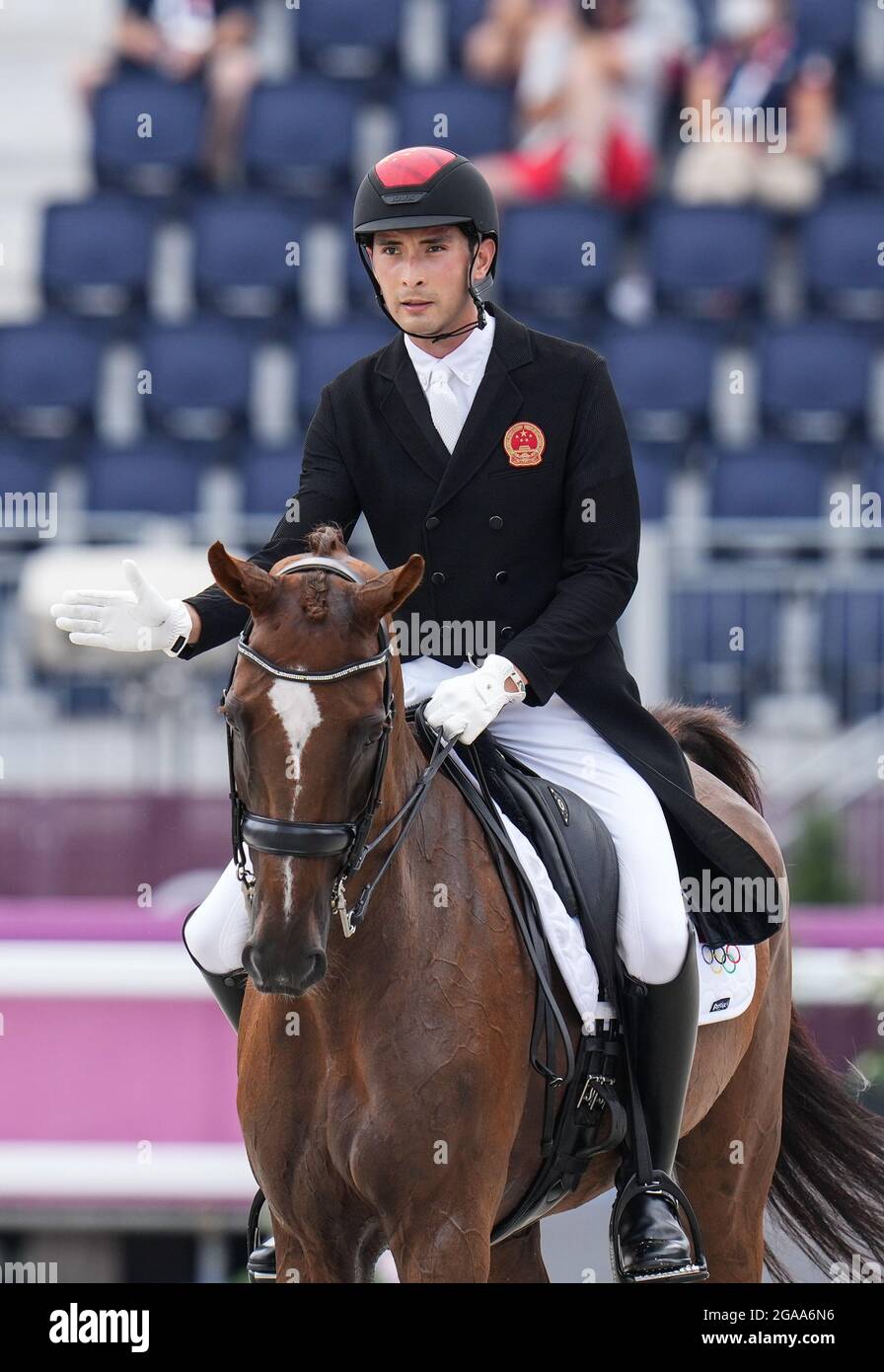 Tokyo, Japan. 30th July, 2021. Alex Hua Tian of China and his horse ...