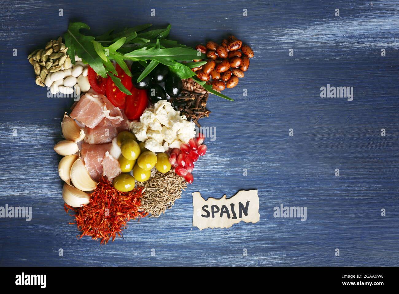 Map of Spain made with ingredients of traditional Spanish cuisine on ...
