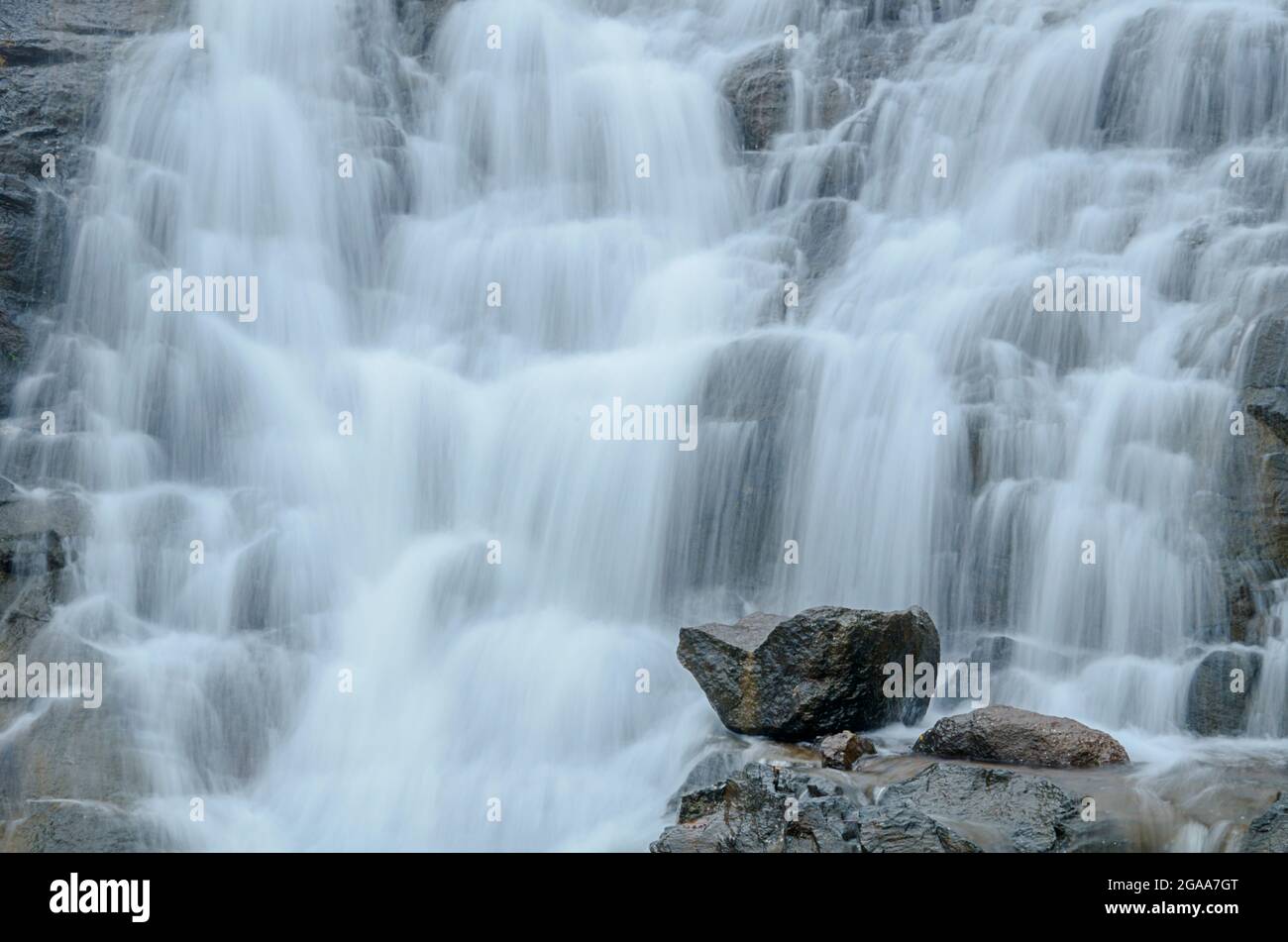 Beautiful waterfall falling on the steps Stock Photo - Alamy