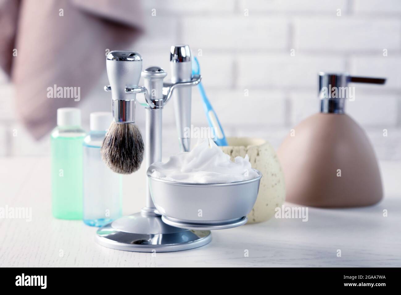 Male luxury shaving kit on shelf, on bricks wall background Stock Photo ...