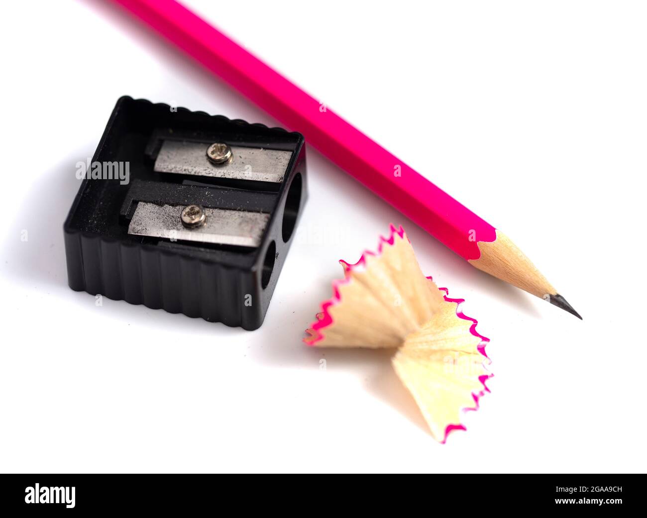 A Freshly Sharpened Pencil and Sharpener Isoalted on a White Background ...