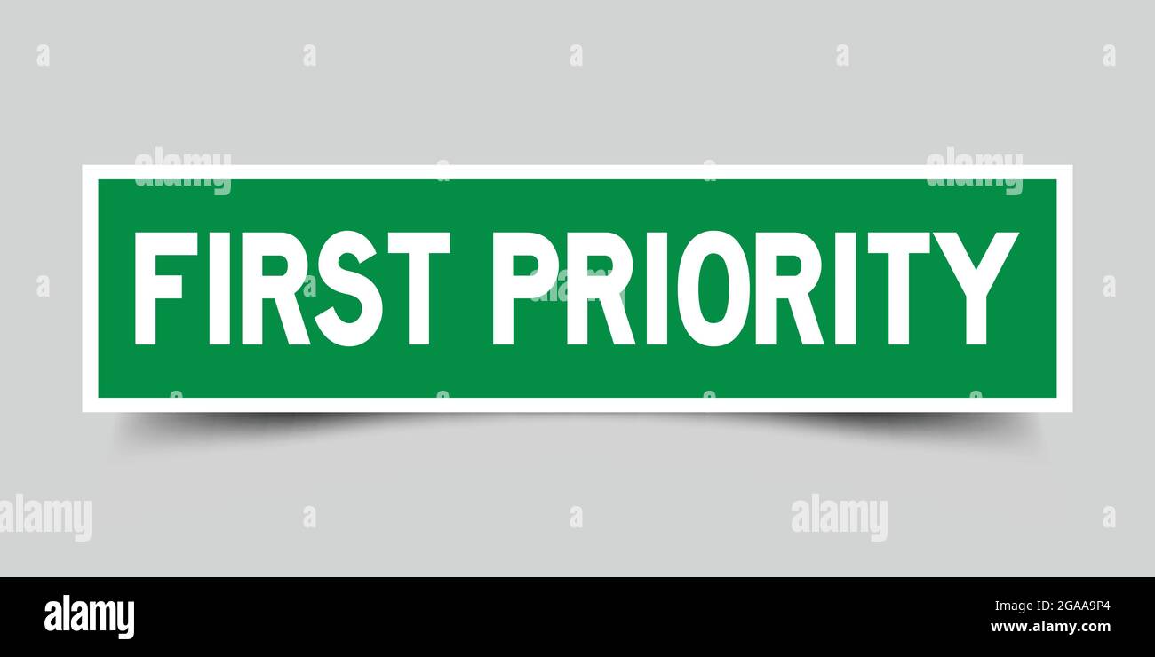 Green color sticker in word first priority on gray background Stock ...
