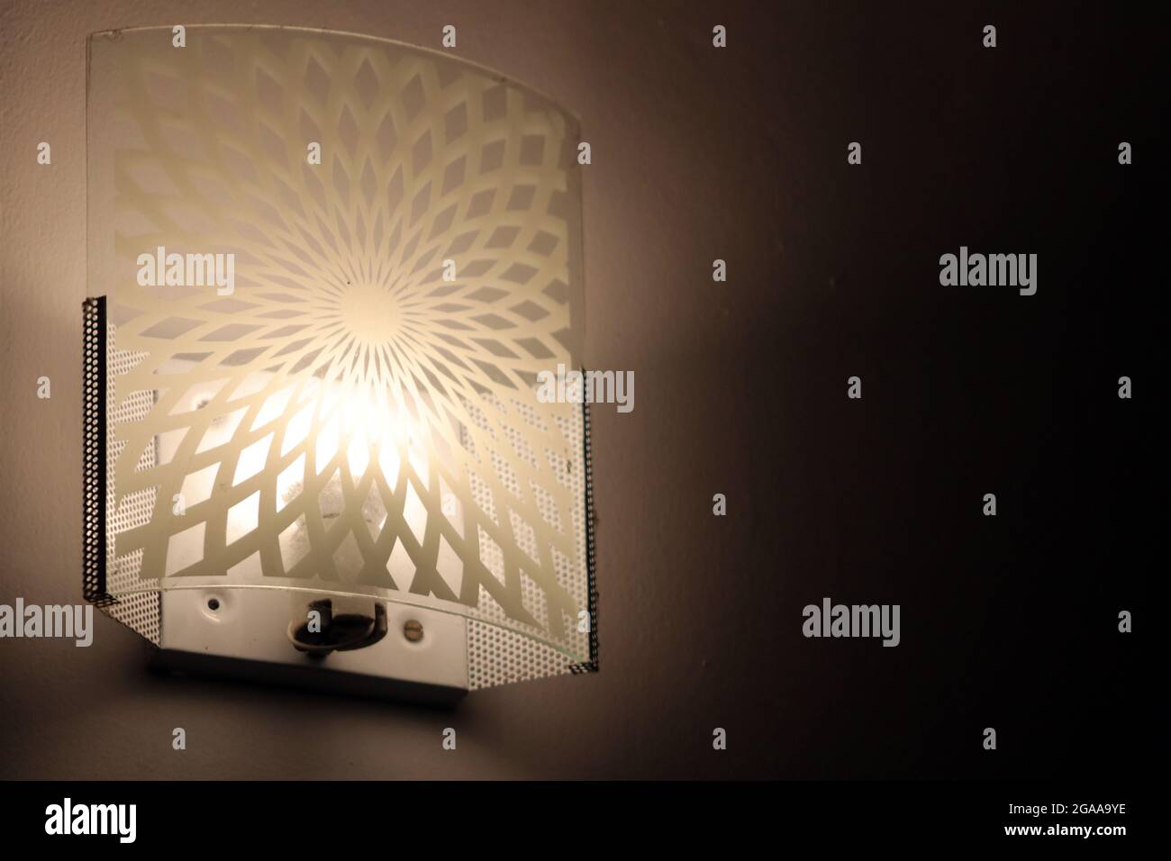 a wall lamp that spreads light Stock Photo - Alamy