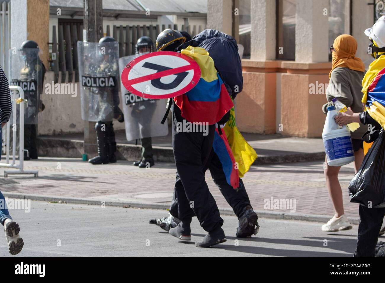 Demonstrators use Colombia's national football team shirts and flags as ...