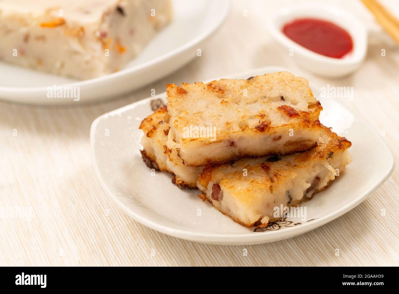 Pan fried Chinese radish cake Stock Photo - Alamy