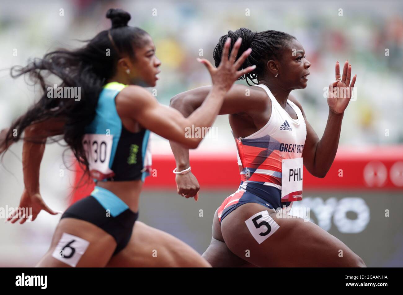 Asha philip in action during the womens 100m hi-res stock photography ...