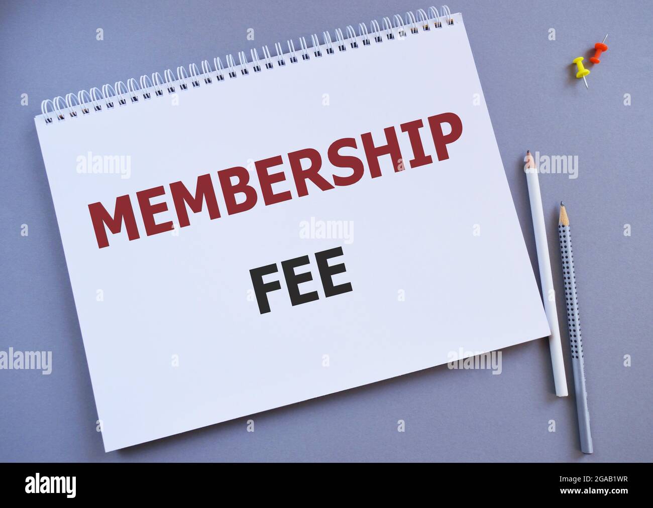 MEMBERSHIP FEE message written in Notebook, business concept image with ...