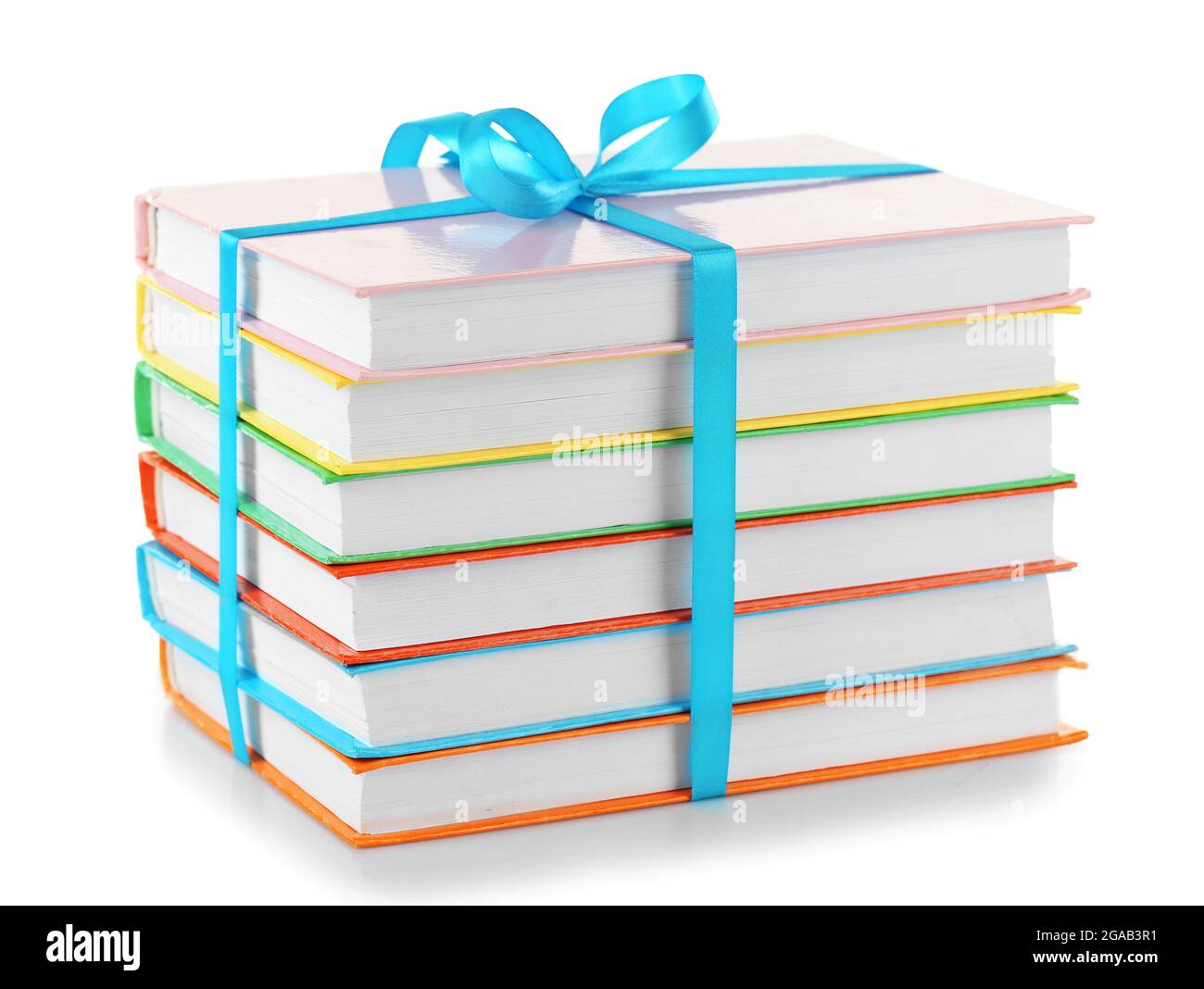 Stack of books with ribbon isolated on white Stock Photo - Alamy