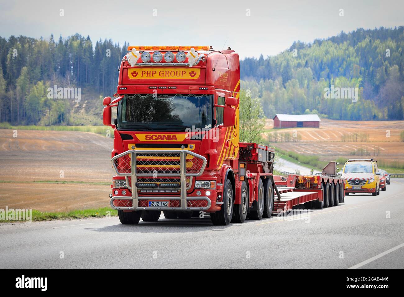 Scania truck of PHP Group in front of gooseneck trailer returns from ...