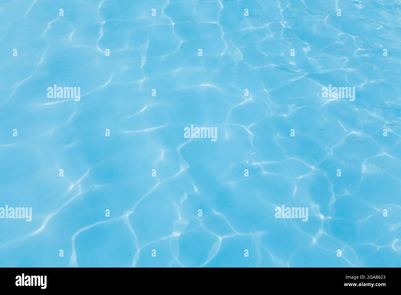 pool blue water reflecting in the sun Stock Photo - Alamy