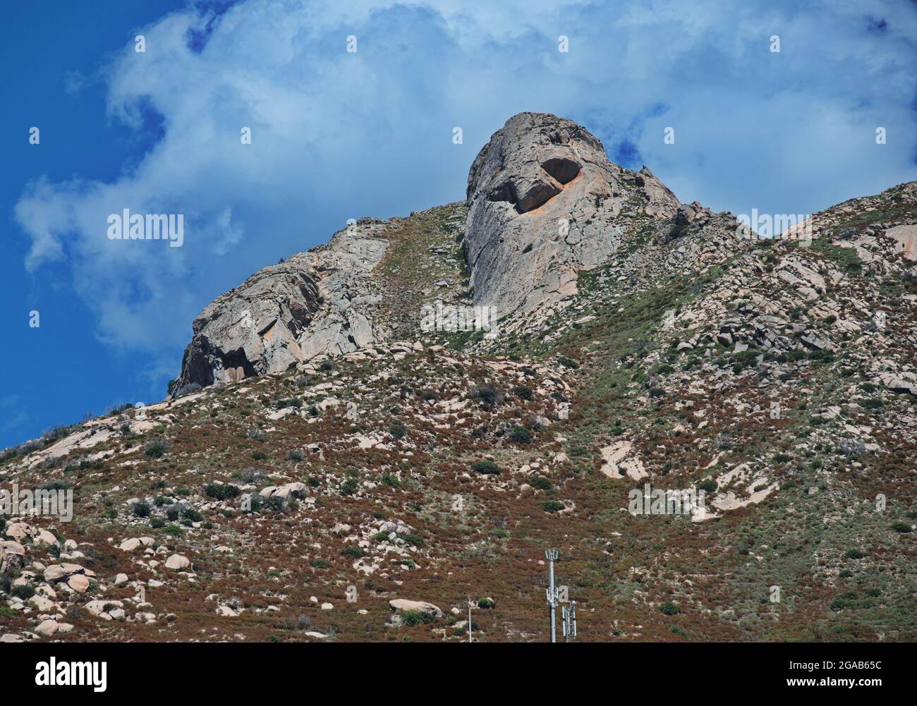 Amazing rock in the shape of human head on Elba island Stock Photo - Alamy