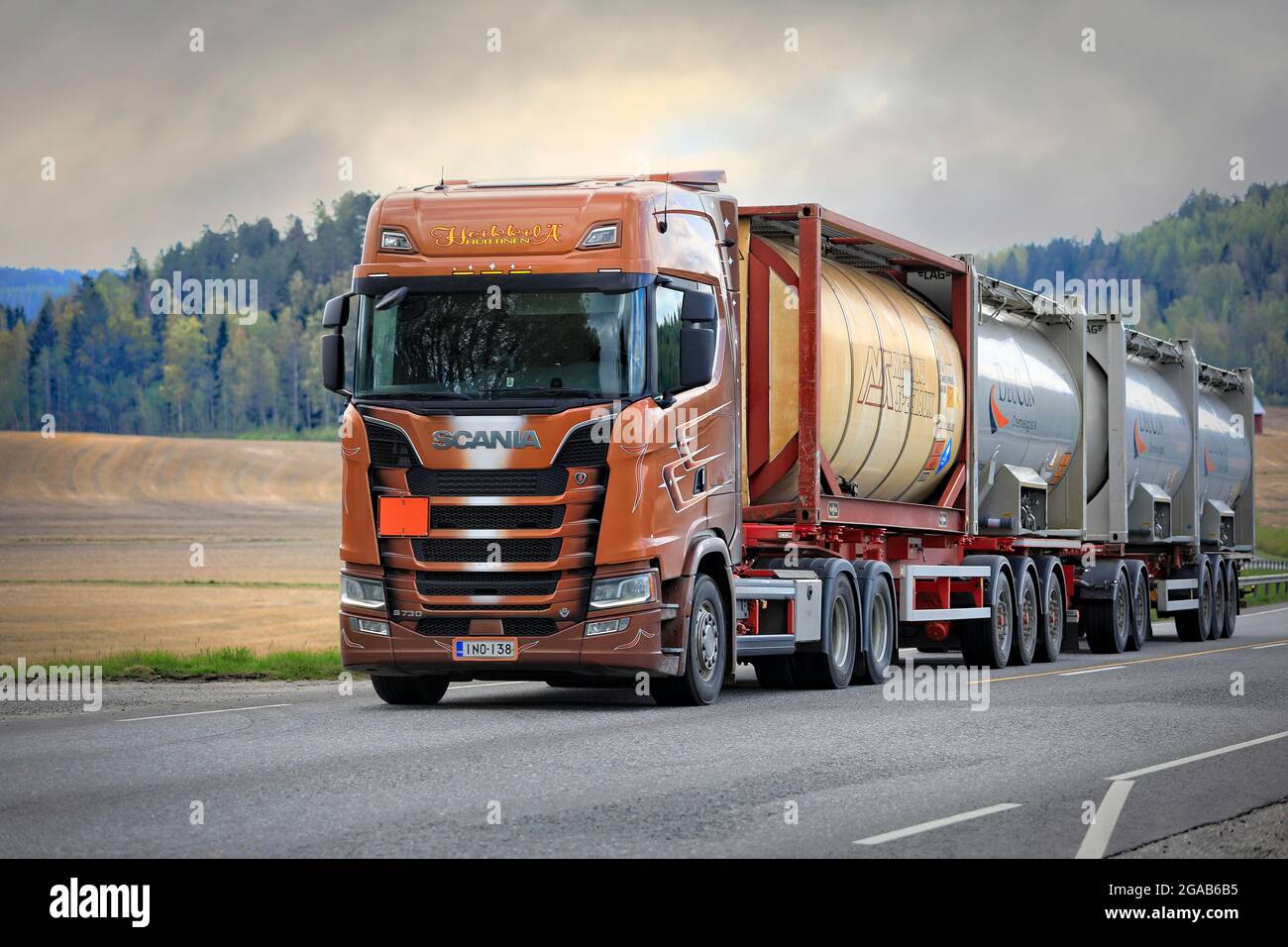 Scania S730 truck of AH-Trans Oy hauls four chemical tank containers on ...