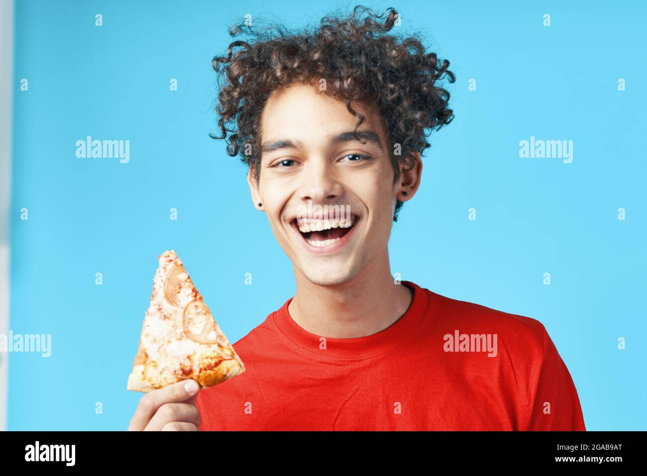 guy with curly hair bird in hands fast food delivery Stock Photo - Alamy