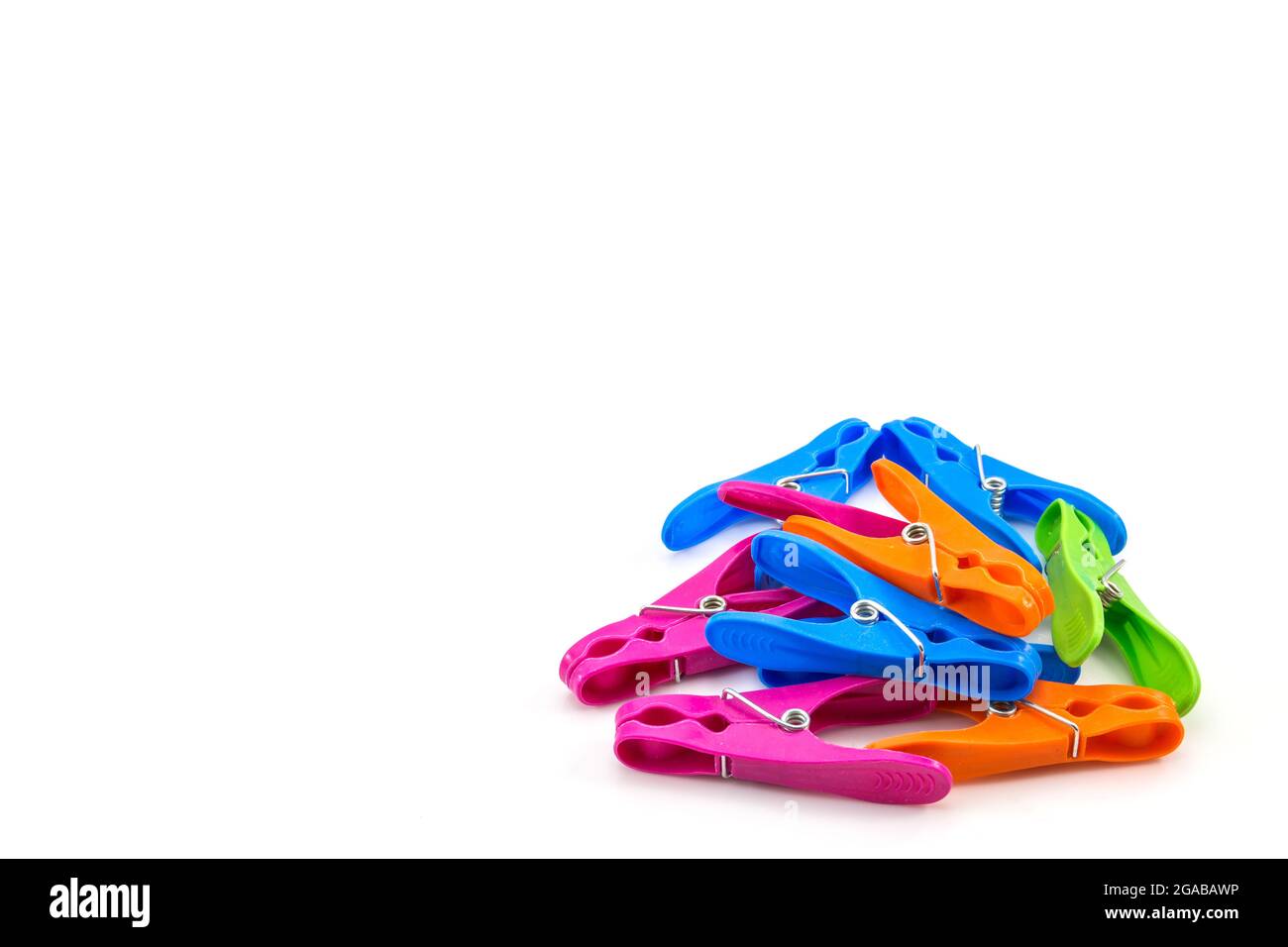 colorful plastic clothes pegs on white background Stock Photo - Alamy