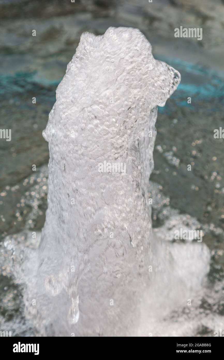 Water stream splashing on the pool background Stock Photo - Alamy