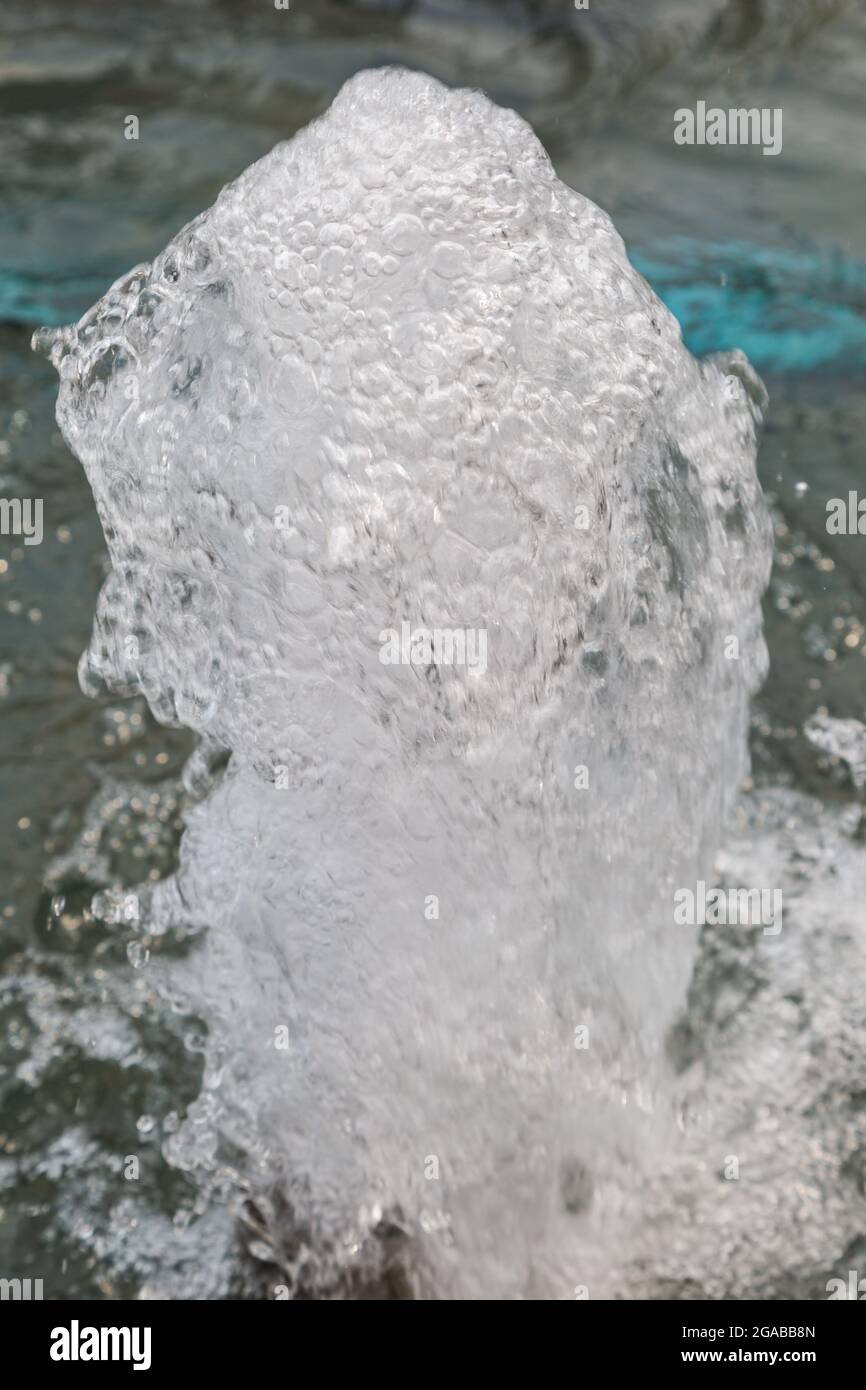 Water stream splashing on the pool background Stock Photo - Alamy