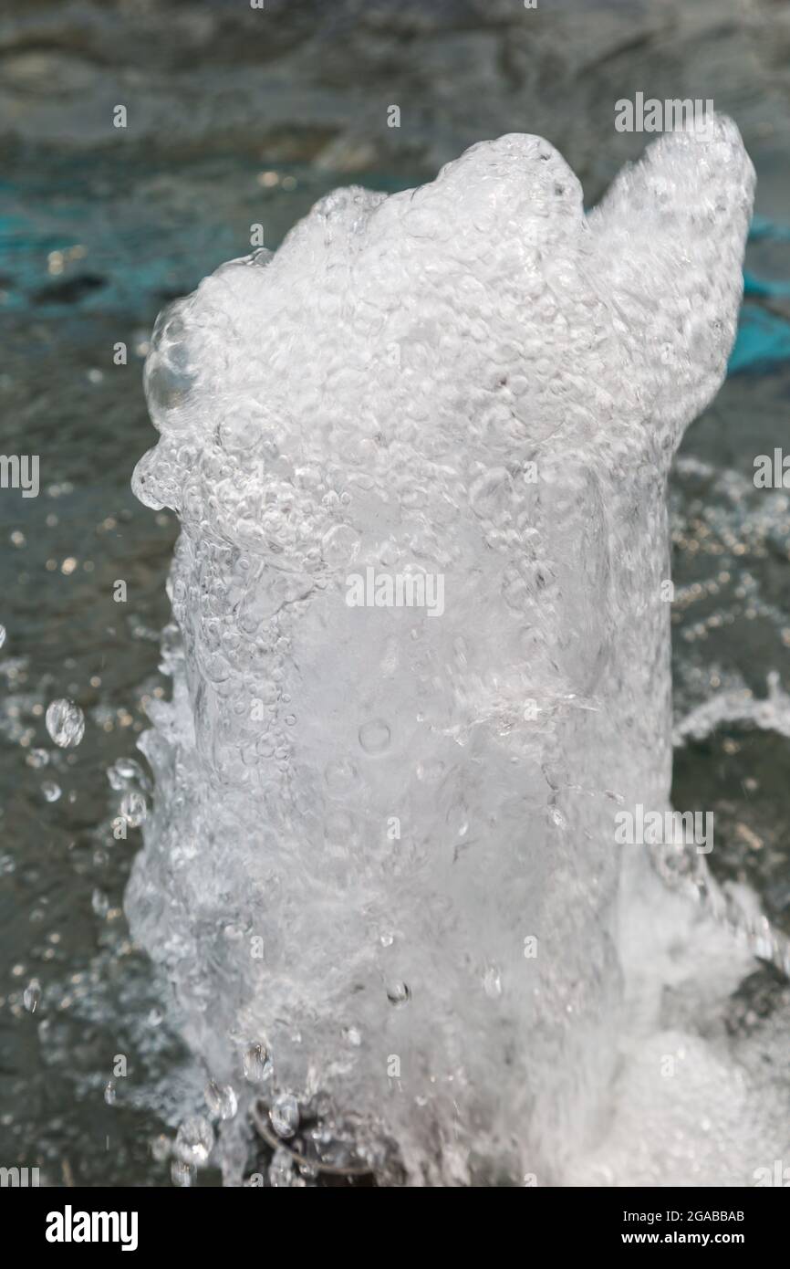 Water stream splashing on the pool background Stock Photo - Alamy