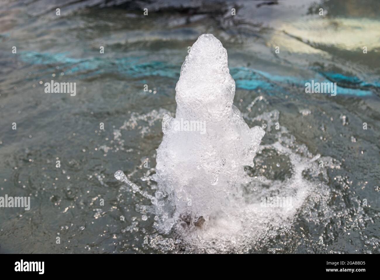 Water stream splashing on the pool background Stock Photo - Alamy