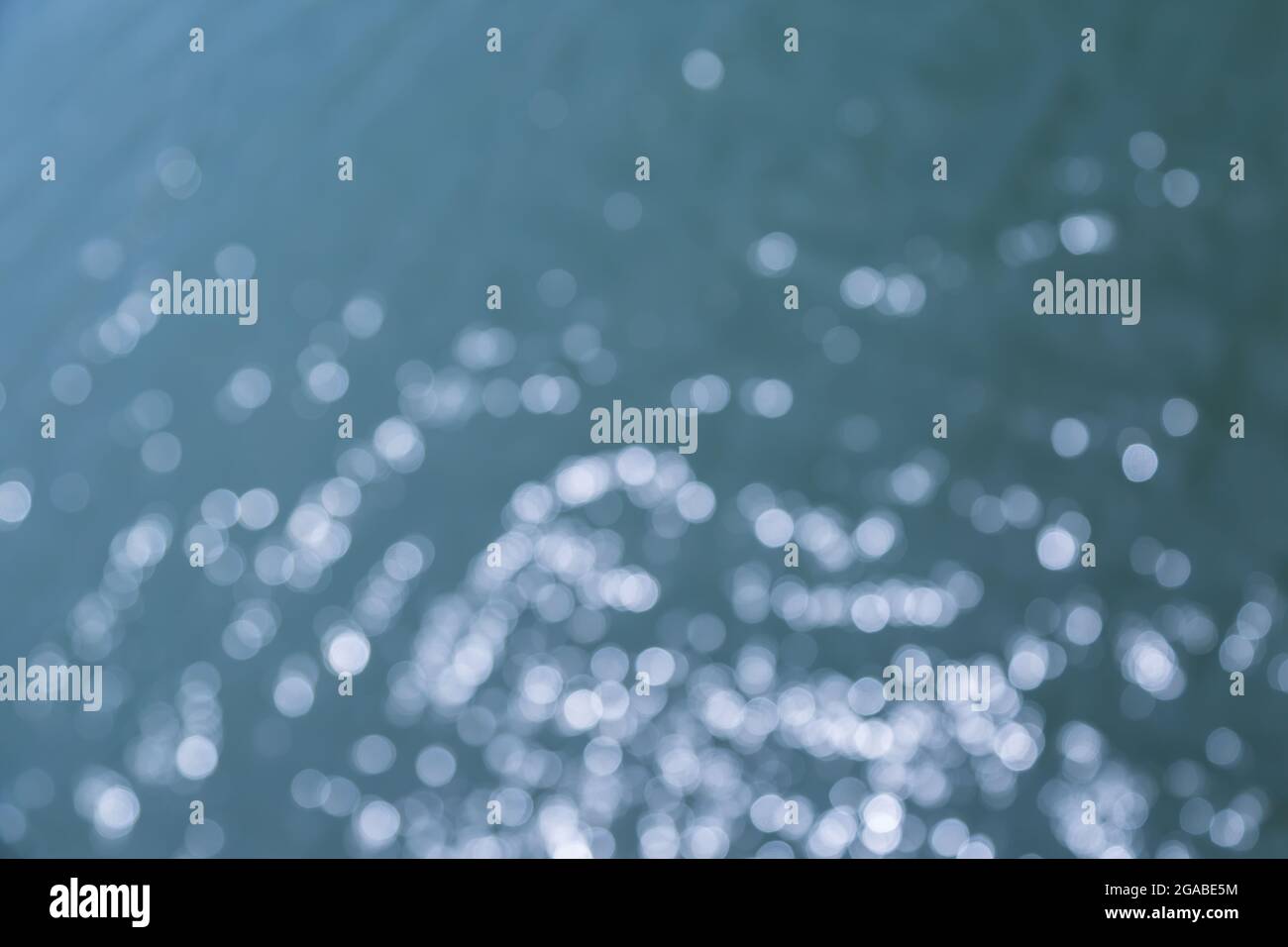 Blue sea water bokeh background nature Stock Photo - Alamy