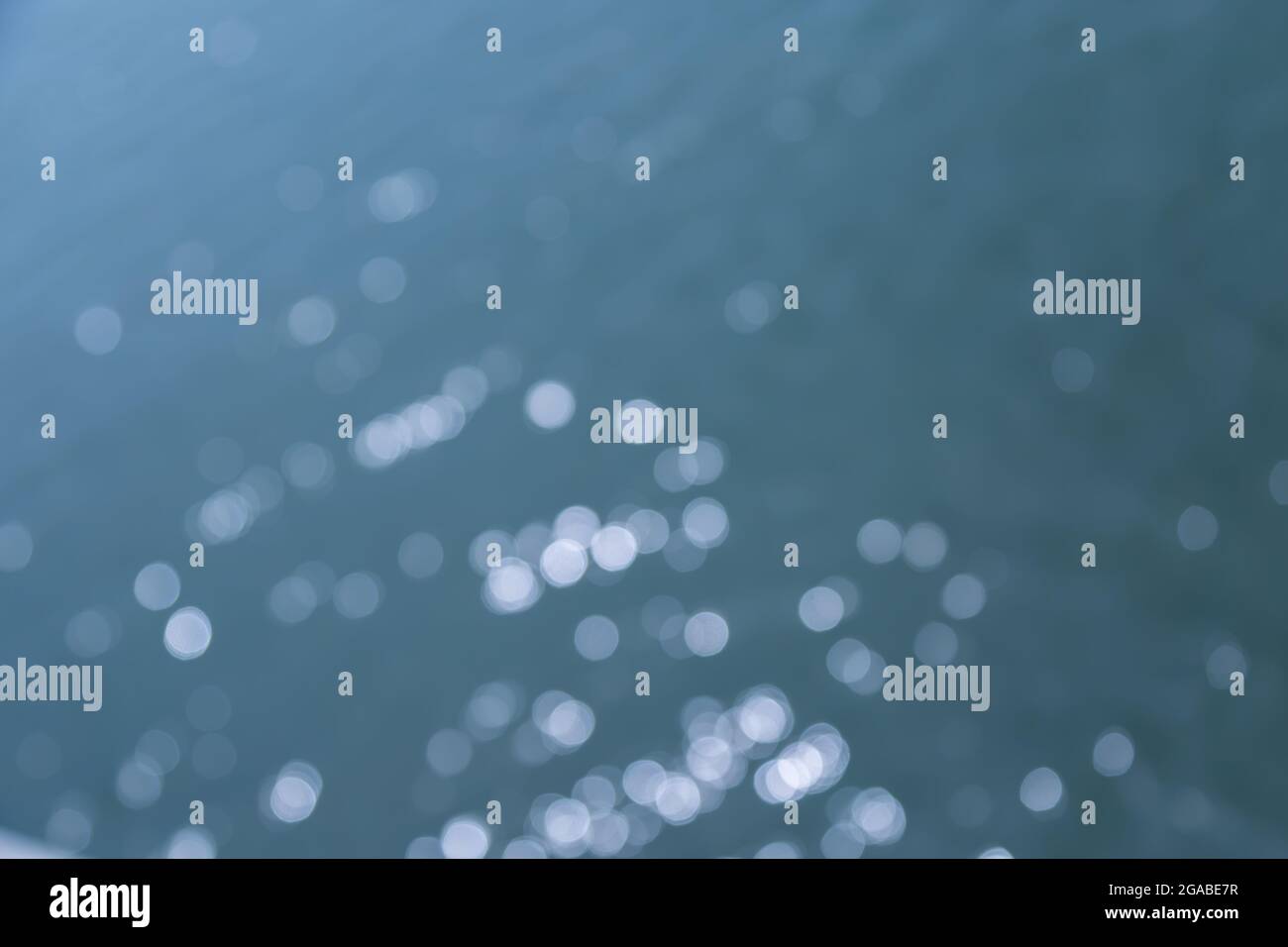 Blue sea water bokeh background nature Stock Photo - Alamy