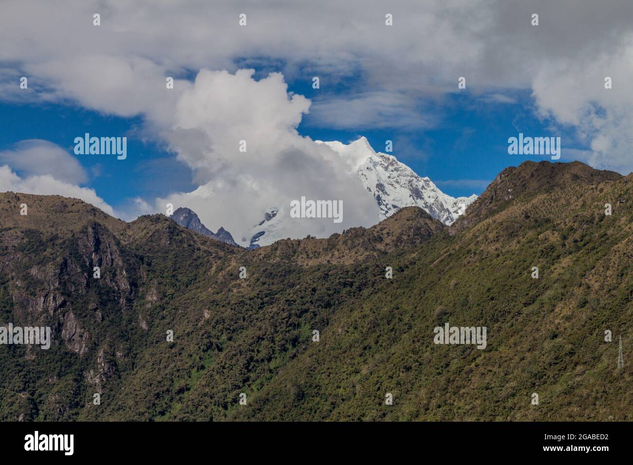 Snow capped peak near Machu Picchu ruins, Peru Stock Photo - Alamy